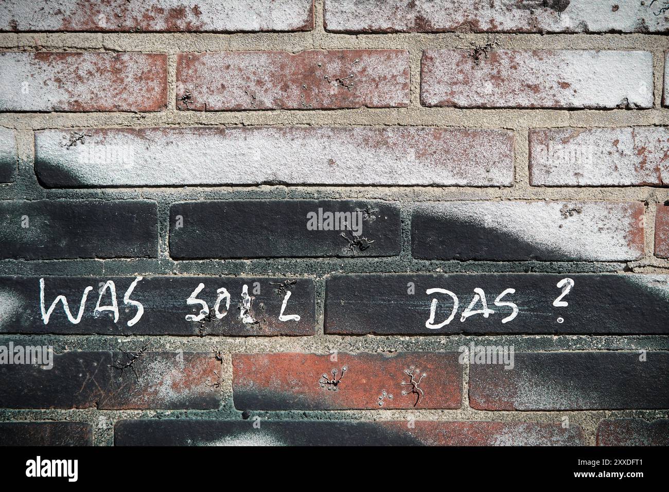 Brick wall with the inscription Stock Photo - Alamy