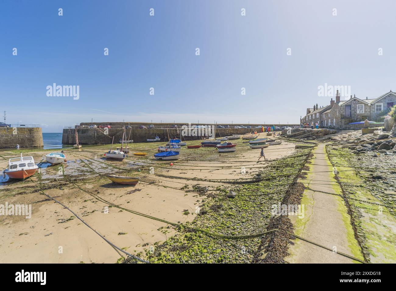 Low tide in the fishing harbour. Great Britain, Cornwall, Mousehole ...