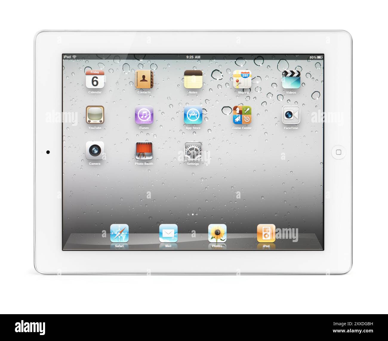 Apple iPad 2 tablet computer with desktop icons on its display ...