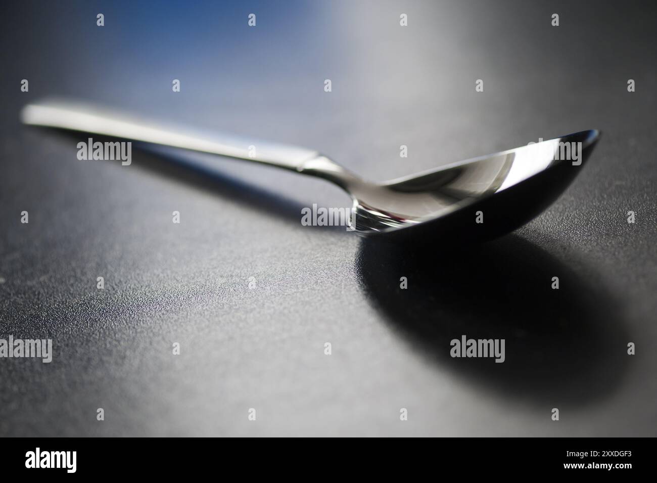 Tilted spoon hi-res stock photography and images - Alamy