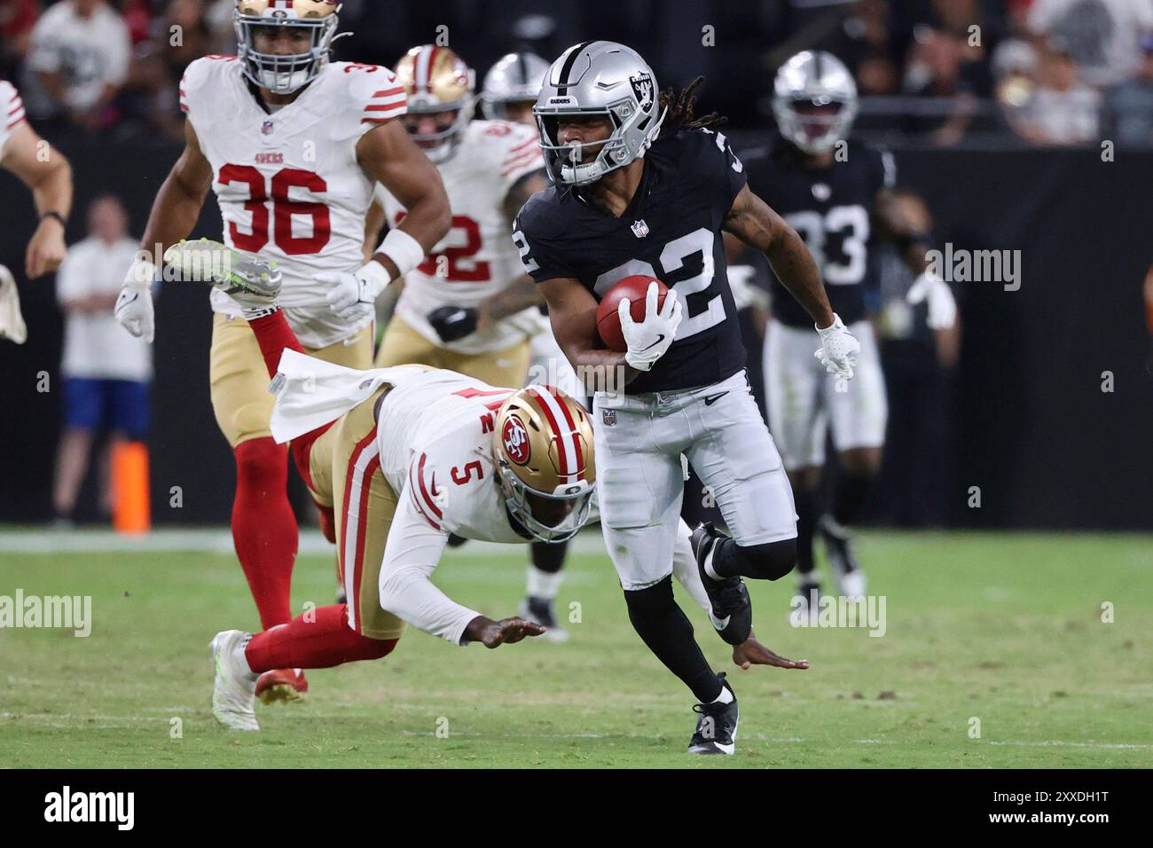 Las Vegas Raiders wide receiver Tyreik McAllister (32) returns a punt ...