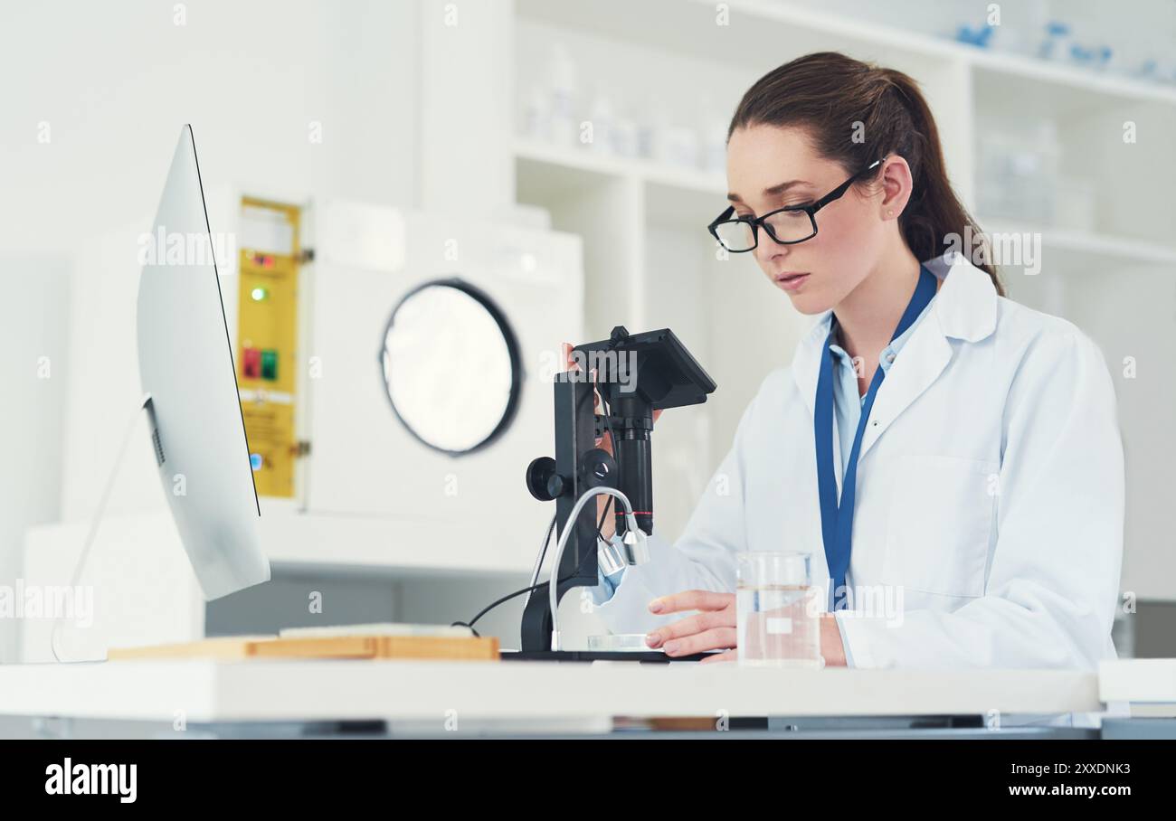 Microscope, sample and scientist with clinical research, science lab ...