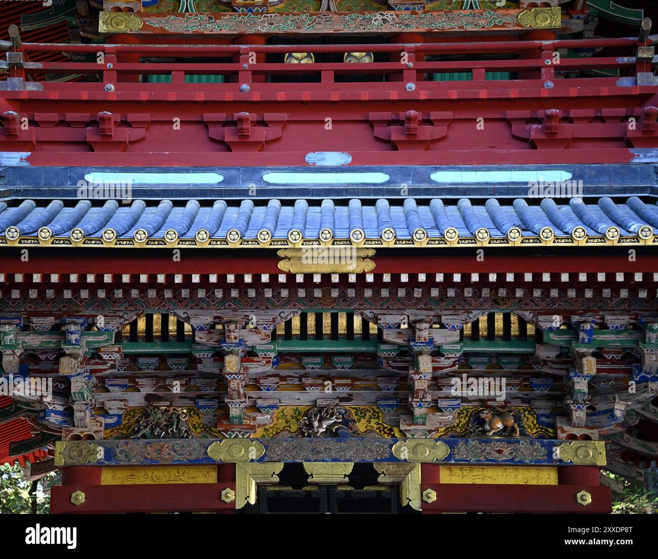 Antique wood carvings in deep relief painted in rich colors on the ...