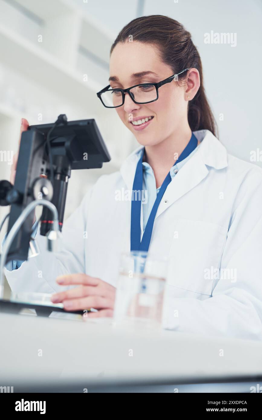 Microscope, sample and scientist with clinical research, chemistry lab ...