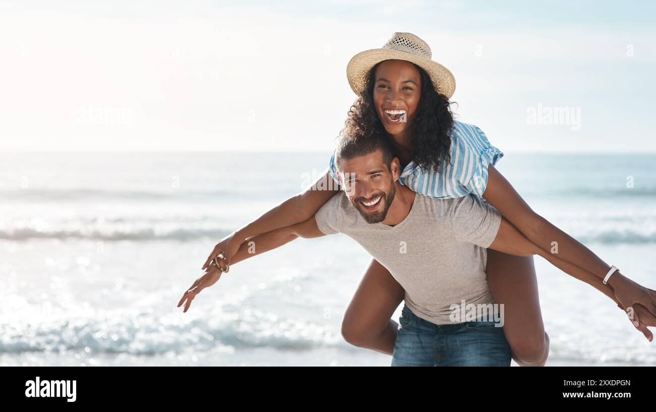 Couple, happy and piggyback at beach for travel, summer and tropical ...