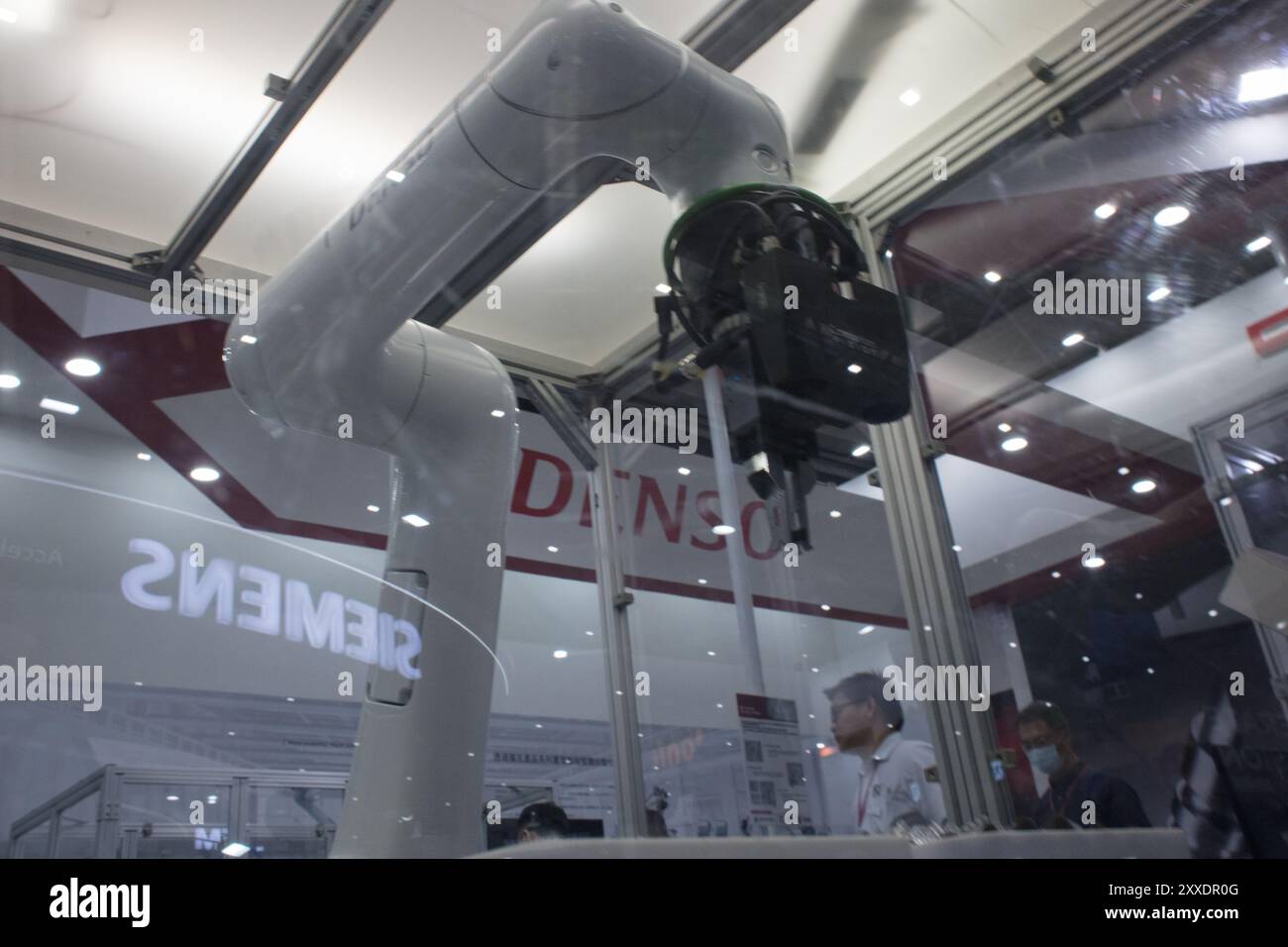 Robotical arm of DENSO are seen at the Artificial Intelligence (AI) and ...