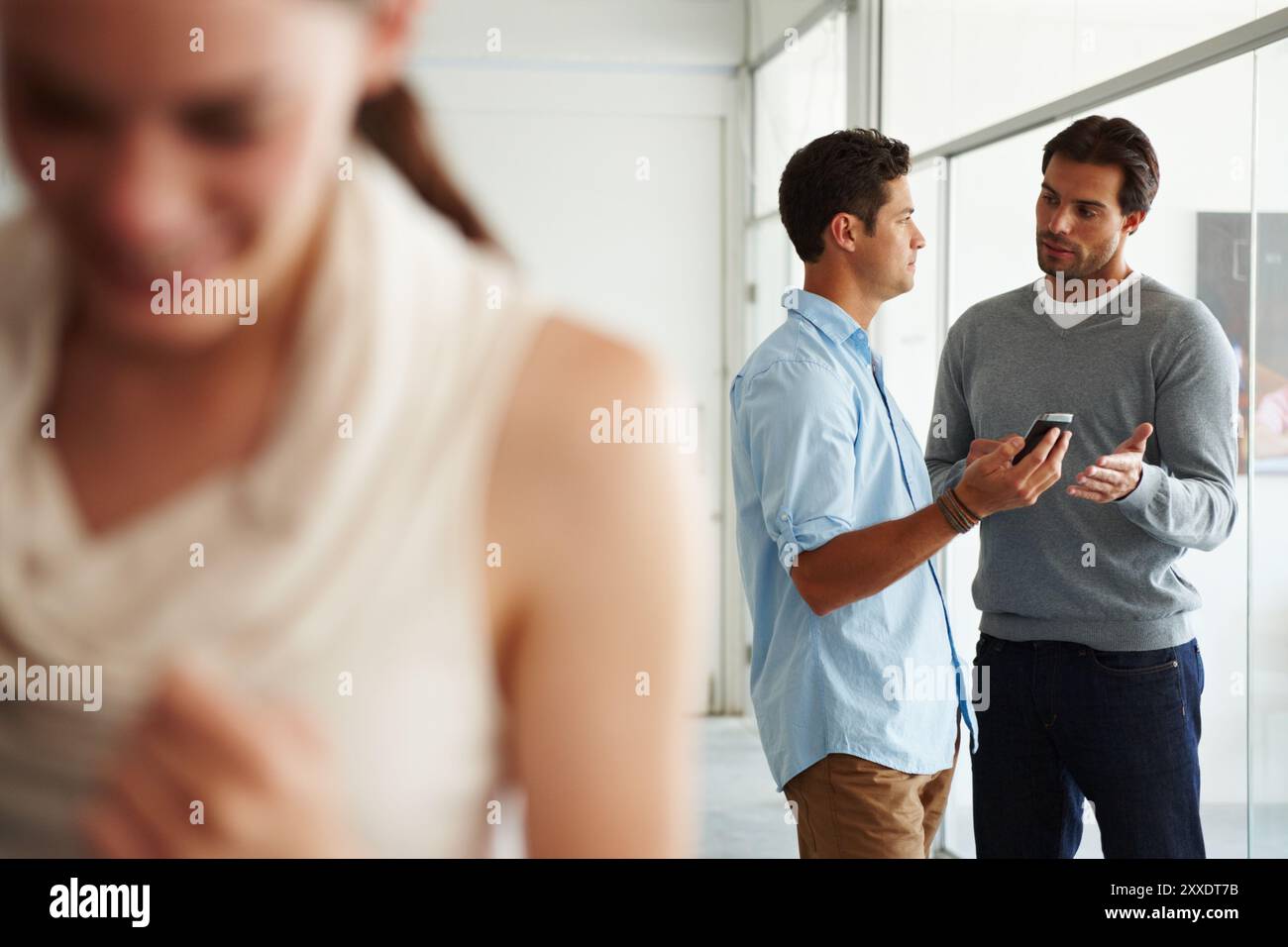 Office, business men and gossip with phone text evidence and discussion ...