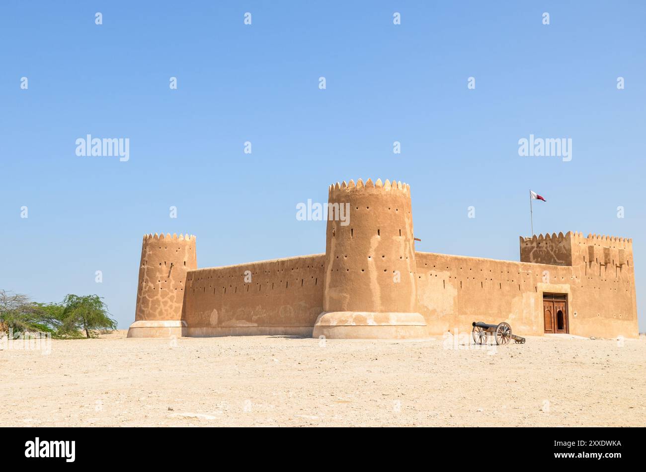 External view of the historical Al Zubarah fort in Qatar with an cannon ...