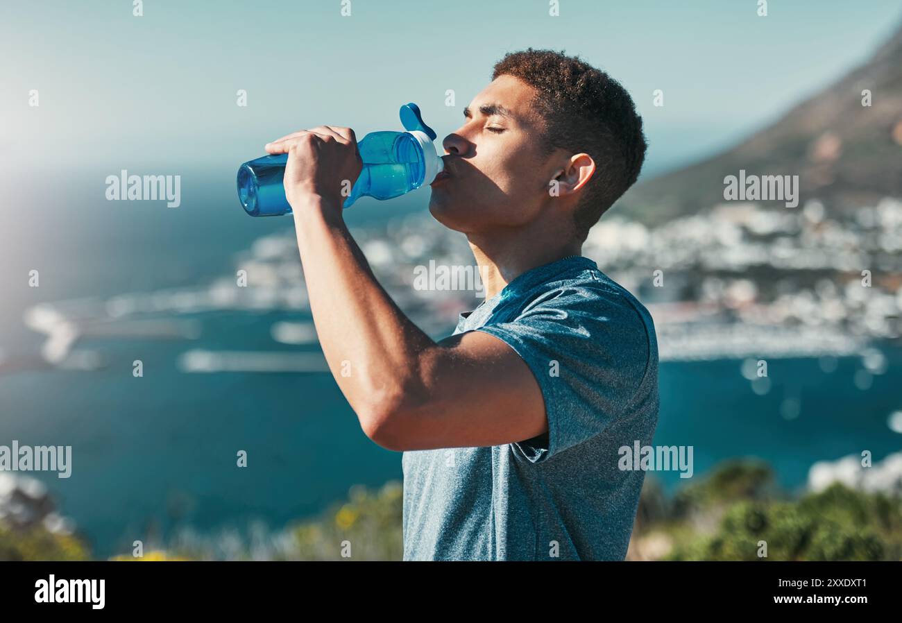 Fitness, man and drinking water outdoor for wellness, body health and ...