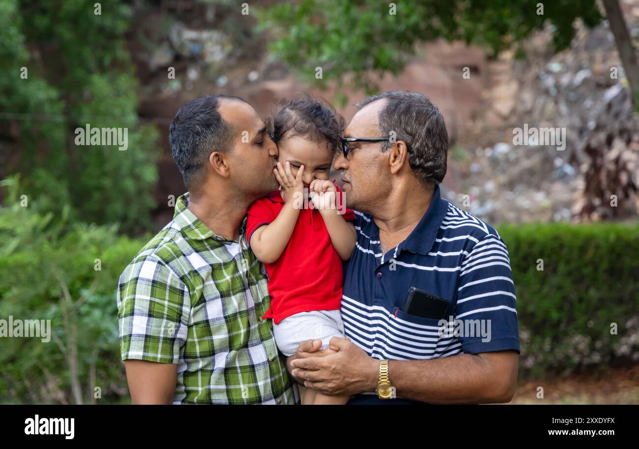 Family Bonding of Three Generations Grandfather, Father, and Grandson ...