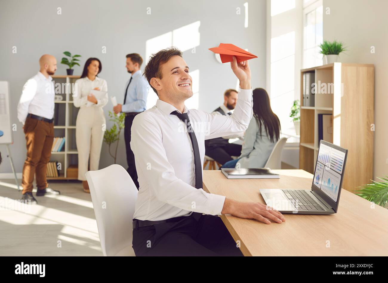 Funny company employee having a rest from a work during a break ...