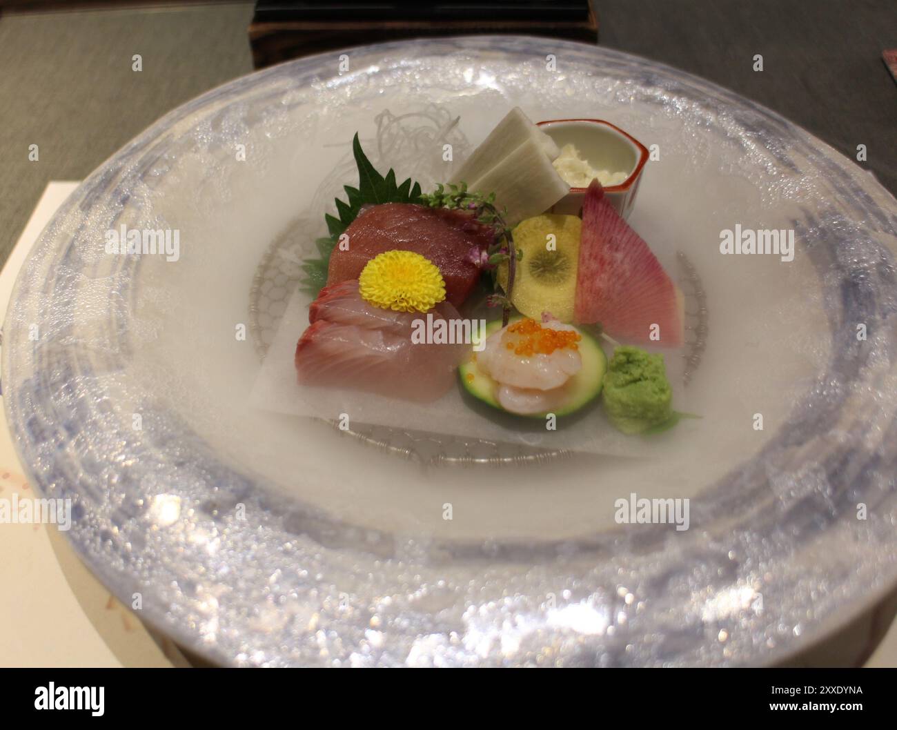 Japanese cuisine: sashimi plate with dry ice decorations in Hakone ...