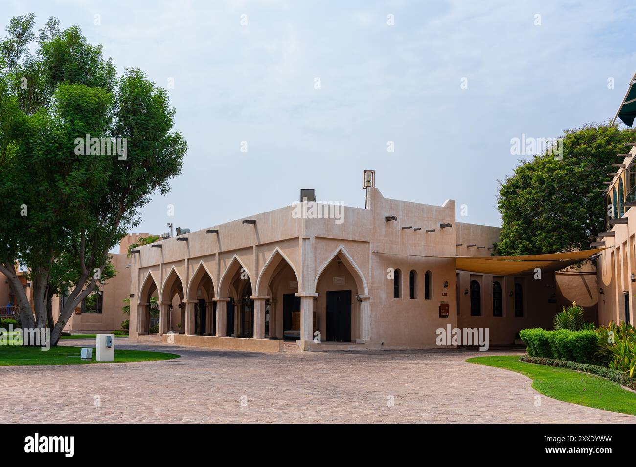eastern arches, street of ethnic village of Qatar. High quality photo ...