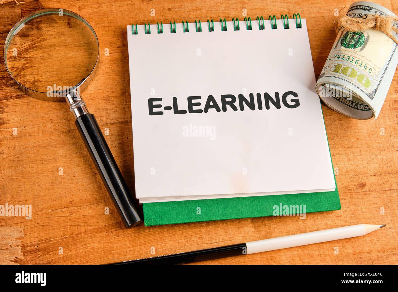 E-LEARNING word in a notebook on a papyrus background Stock Photo - Alamy