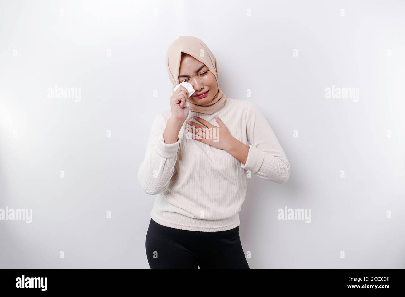 Muslim woman hijab crying hi-res stock photography and images - Alamy