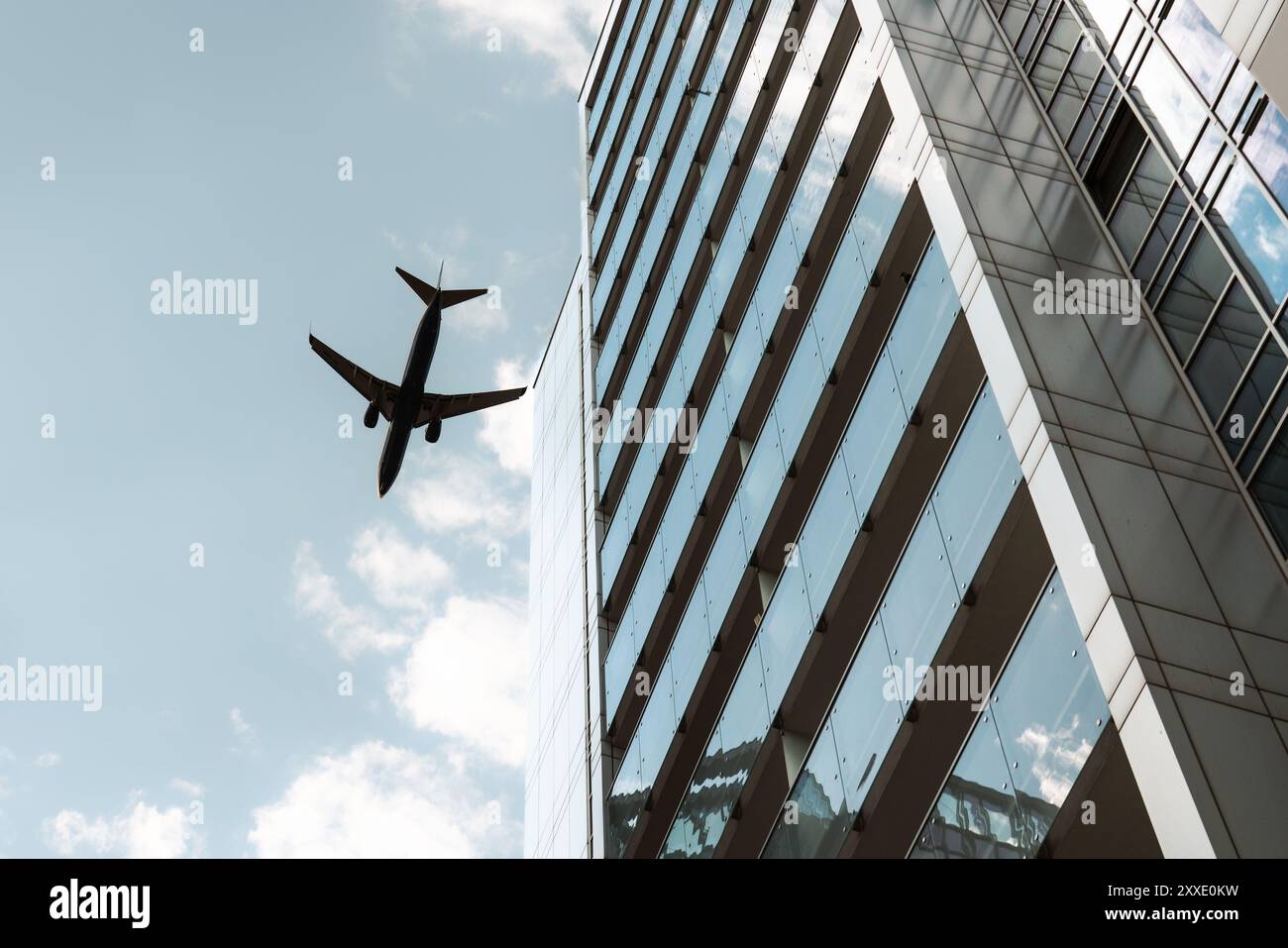 Airplane shadow skyscraper hi-res stock photography and images - Alamy