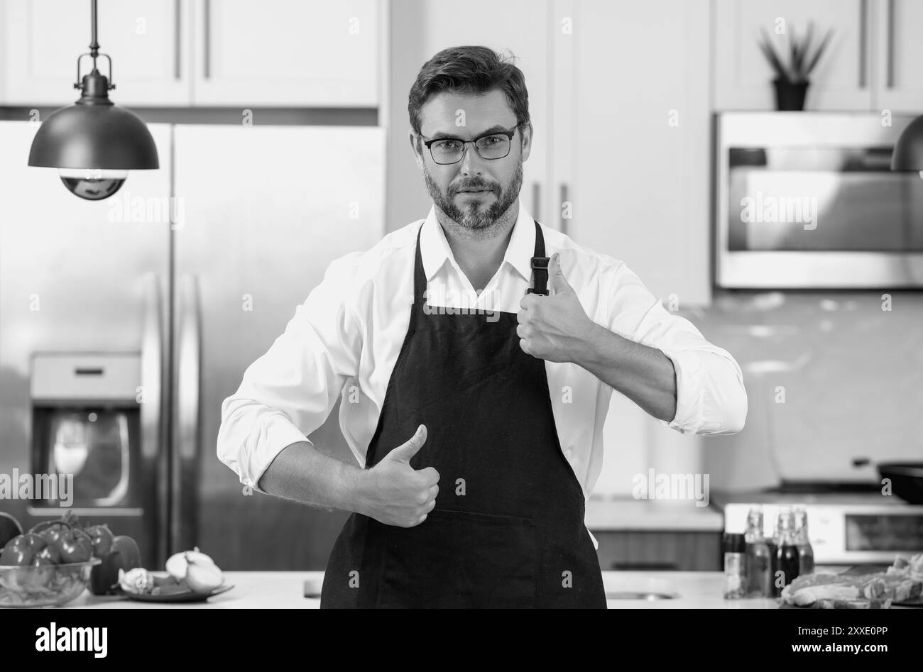 Hispanic chef kitchen Black and White Stock Photos & Images - Alamy