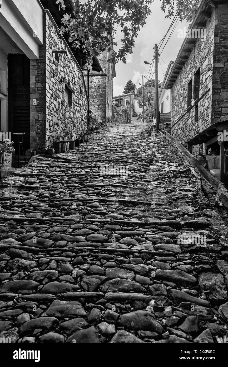 Cobbled alley at Kissos, Pelion, Greece Stock Photo - Alamy