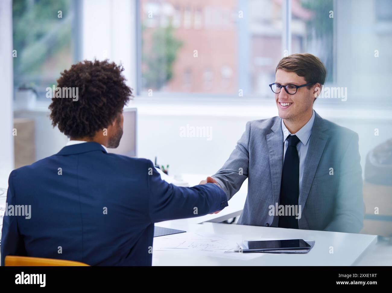 Partnership, man and happy with handshake at office for welcome with ...