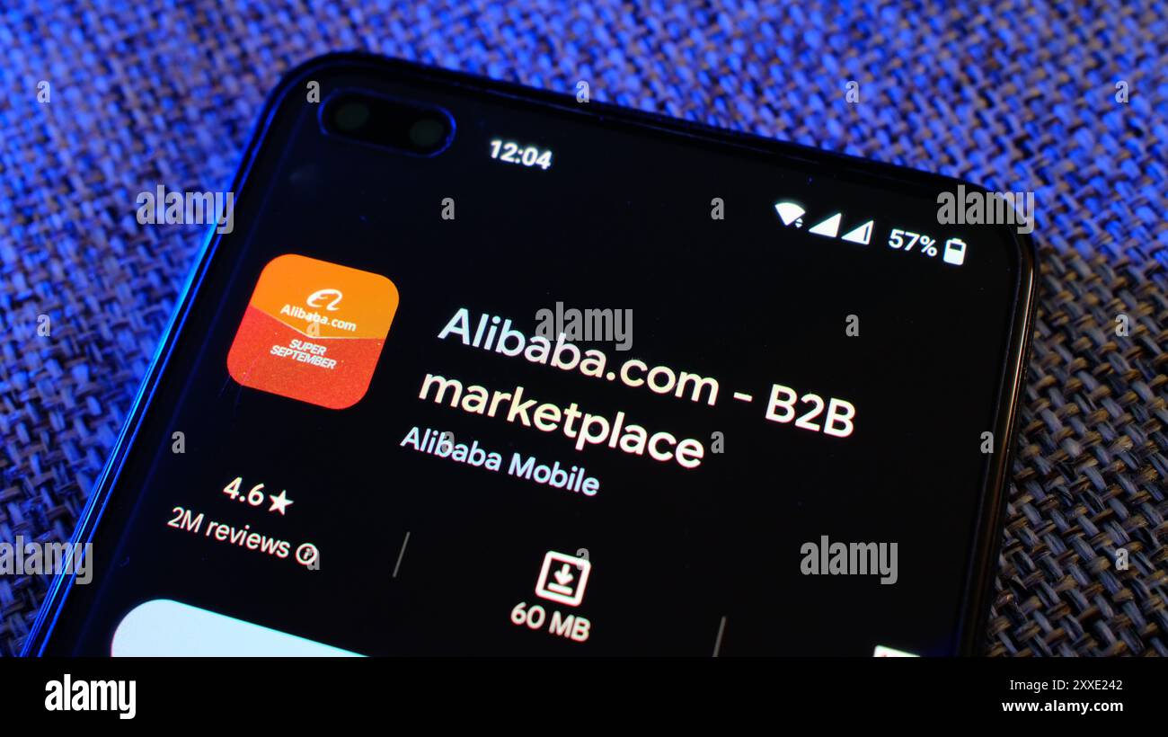 Alibaba B2B marketplace app in play store page on mobile phone display. London, UK, 08.24.2024 ...