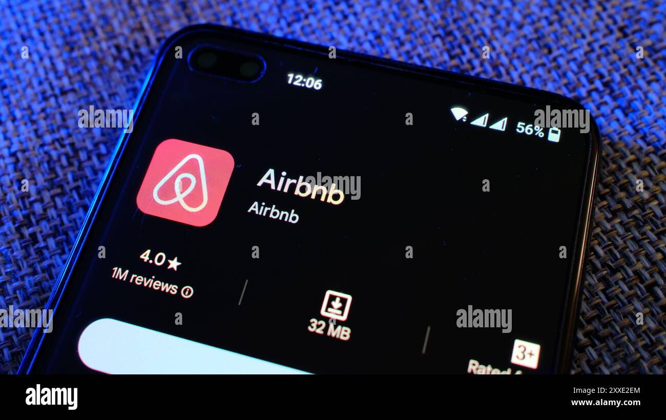 Airbnb booking service app in play store page on mobile phone display. London, UK, 08.24.2024 ...
