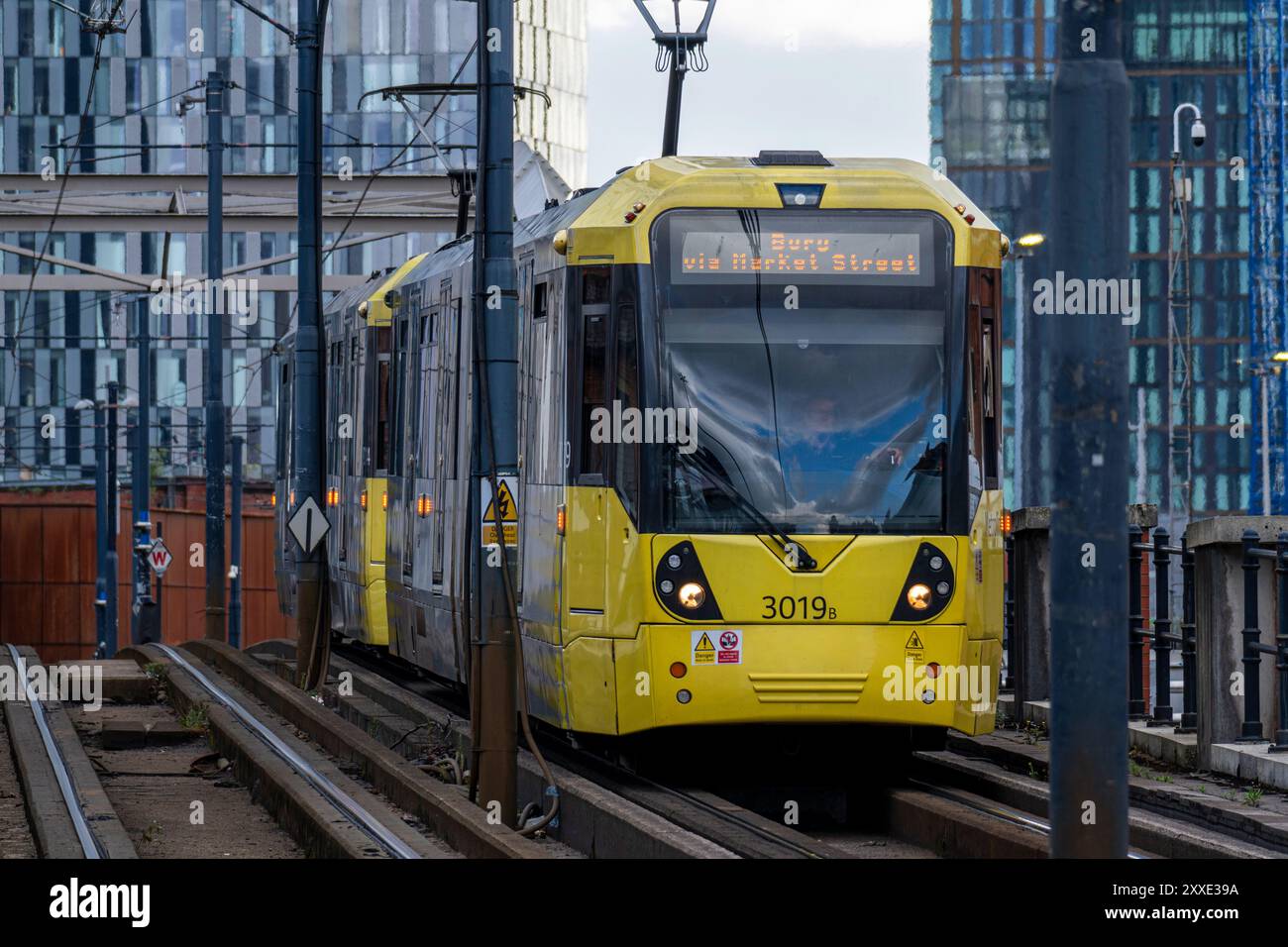 A yellow tram in Manchester going towards St Peter's square in ...