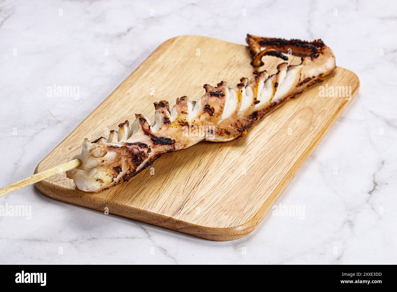 Delicous tasty Grilled octopus tentacle snack Stock Photo - Alamy