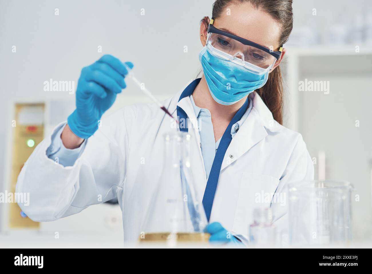Scientist, experiment and woman with pipette in laboratory for medical ...