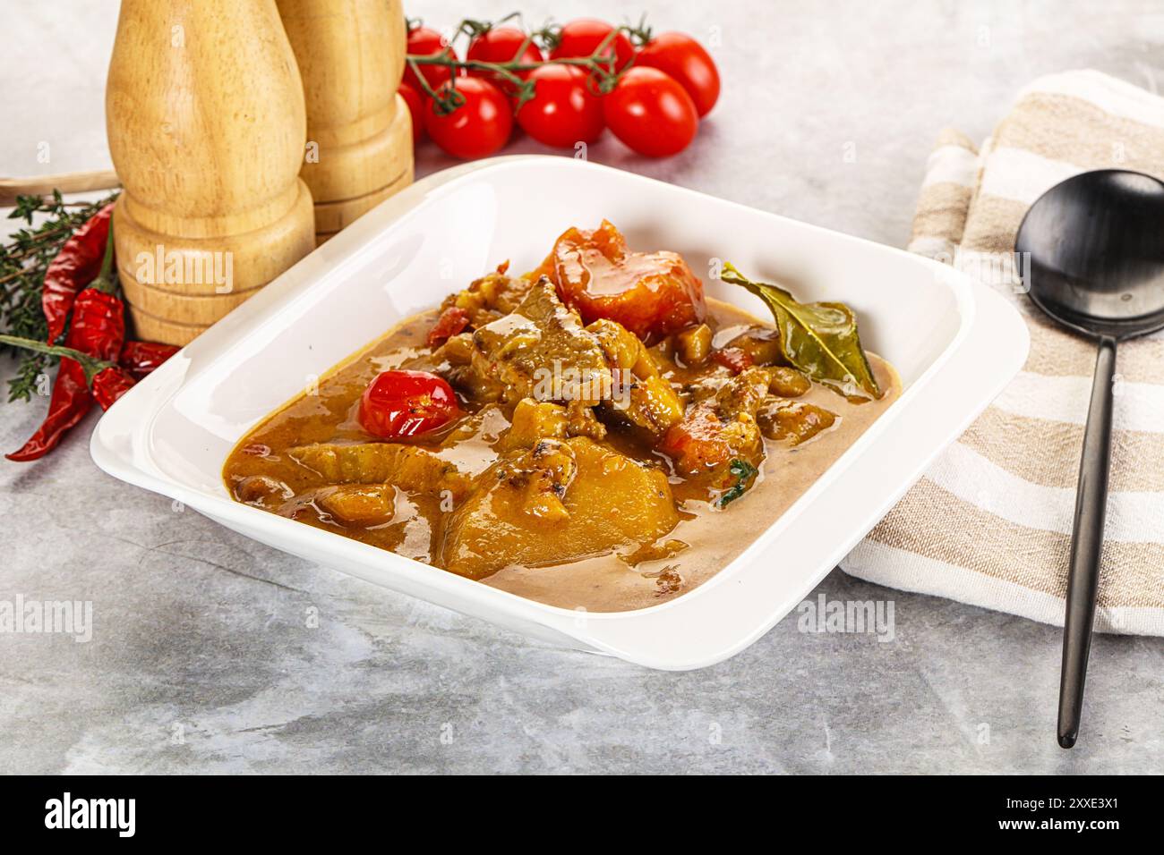 Yellow Thai curry soup with beef Stock Photo - Alamy