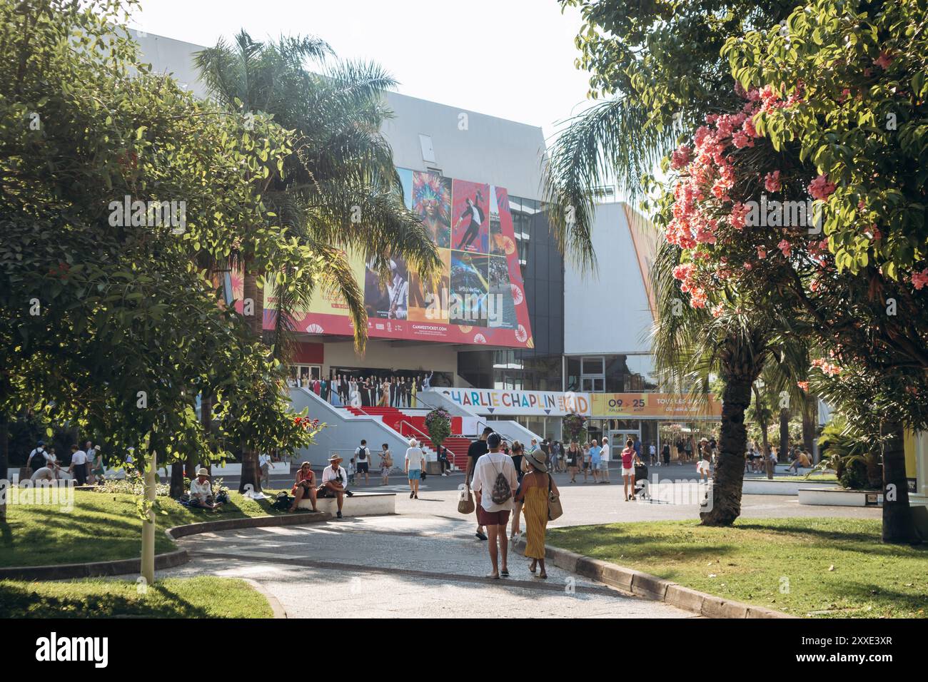 Cannes, France - August 1, 2024: People stroll in the park near the ...