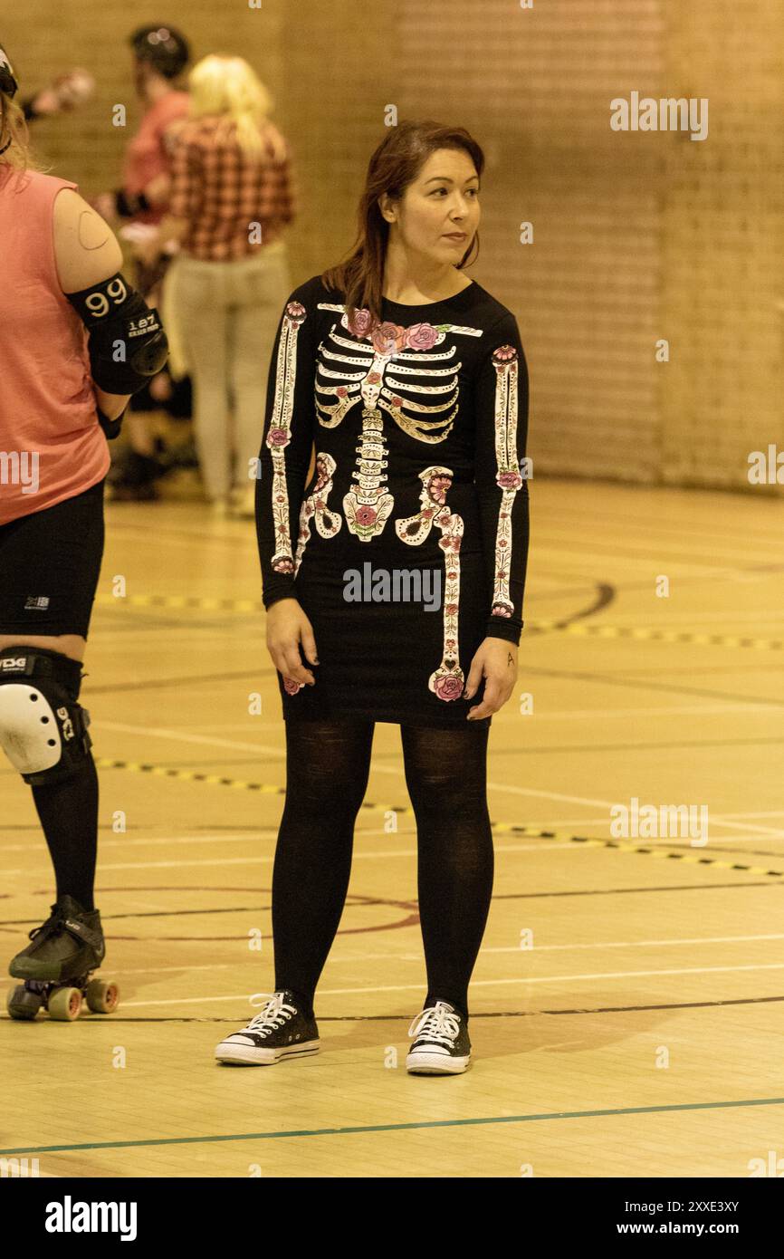 At a roller derby bout between two mixed league teams in the ...