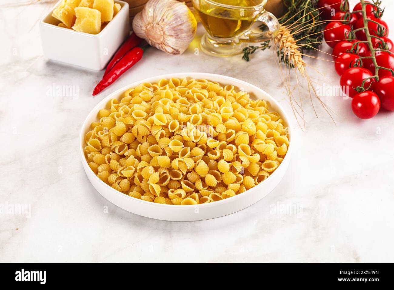 Italian cuisine - dry conchiglie shell pasta Stock Photo - Alamy