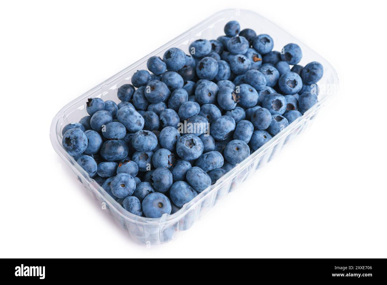 Fresh raw organic blueberries in transparent plastic container isolated ...