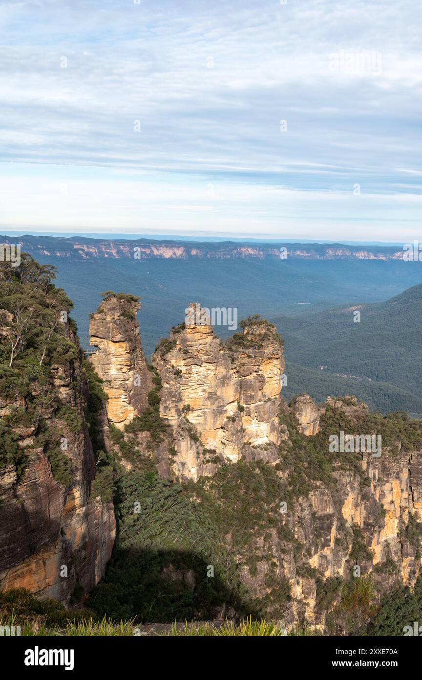The famous three finger-shaped peaks are known as The Three Sisters ...