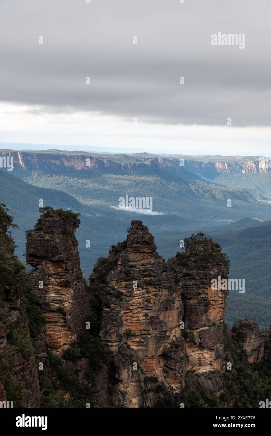 The famous three finger-shaped peaks is known as The Three Sisters ...