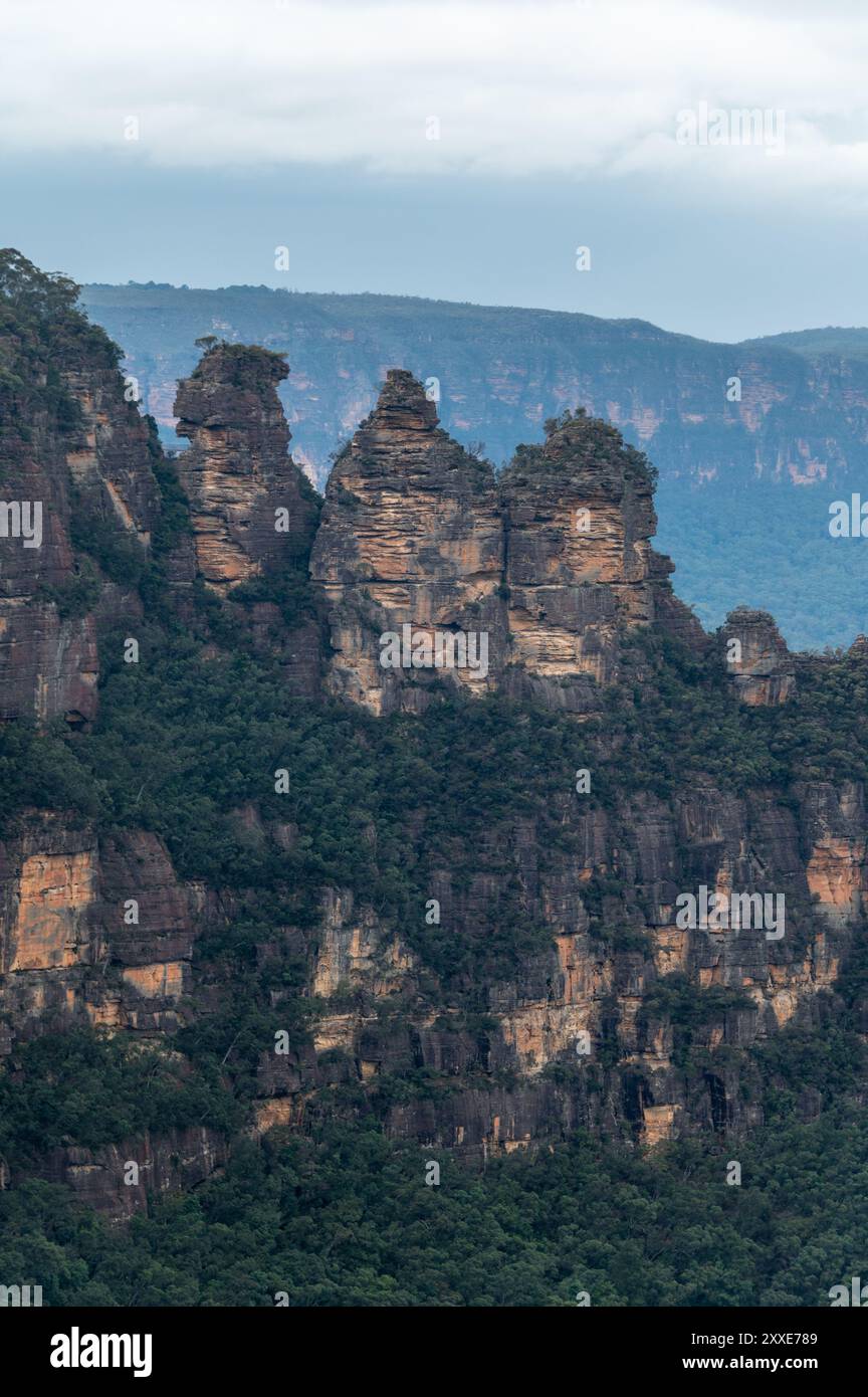 The famous three finger-shaped peaks are known as The Three Sisters ...