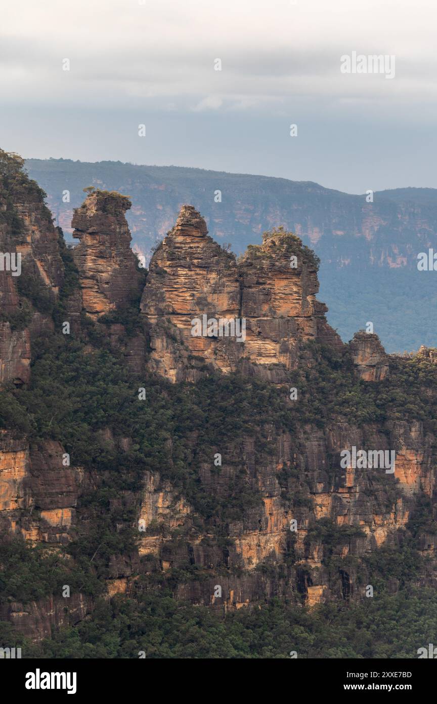 The famous three finger-shaped peaks is known as The Three Sisters ...