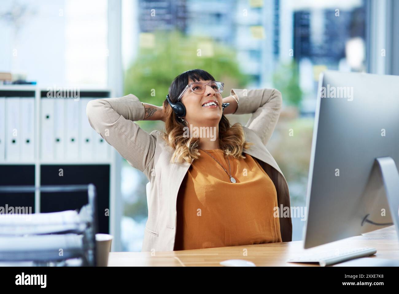 Thinking stretching and woman in office, smile and done with target in ...