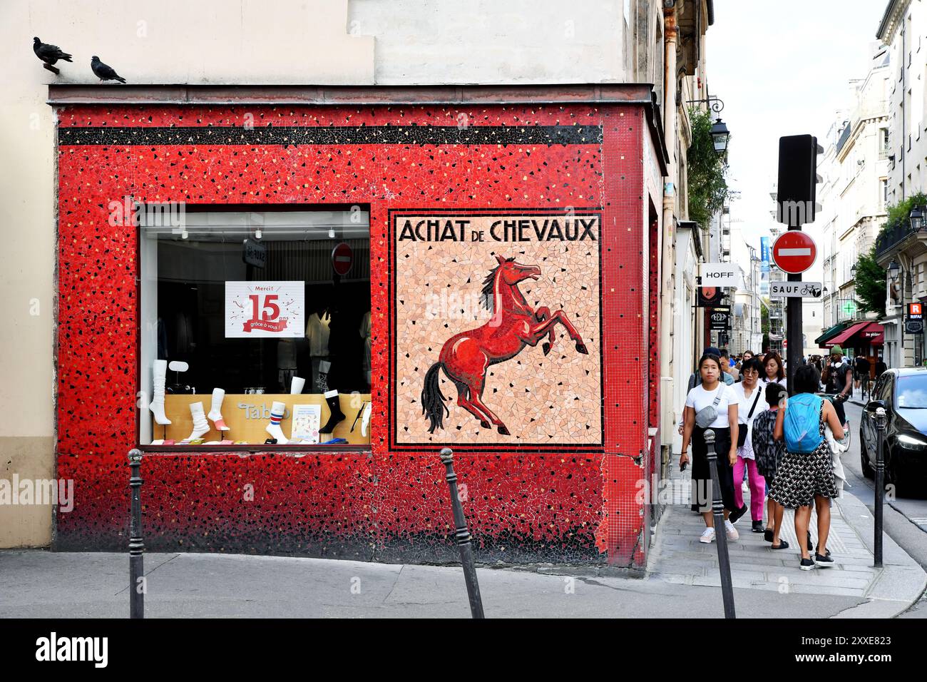 Old shop turned with buying horses sign turned into a clothes store ...