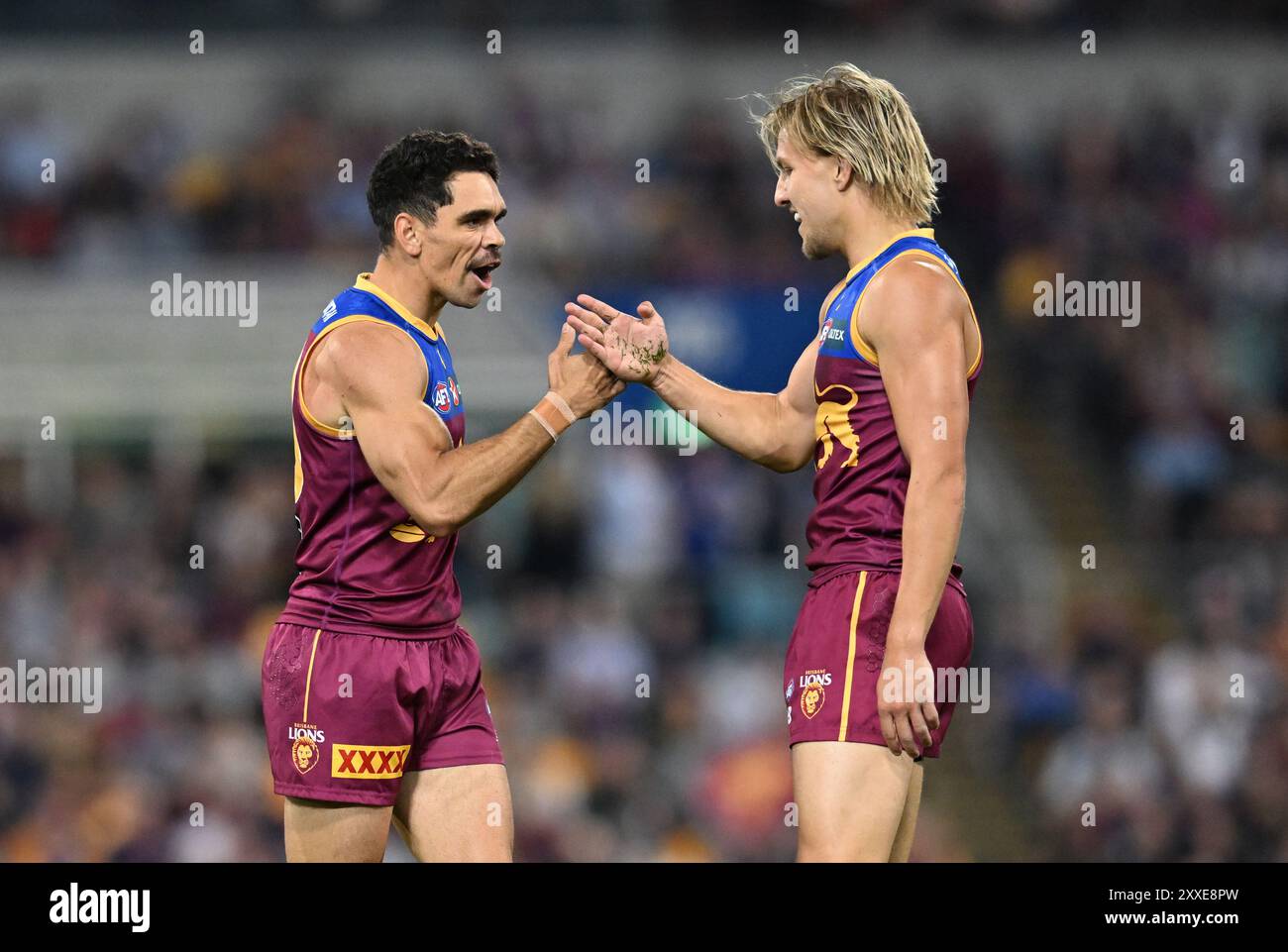Brisbane, Australia. 24th Aug, 2024. Charlie Cameron (left) of the ...
