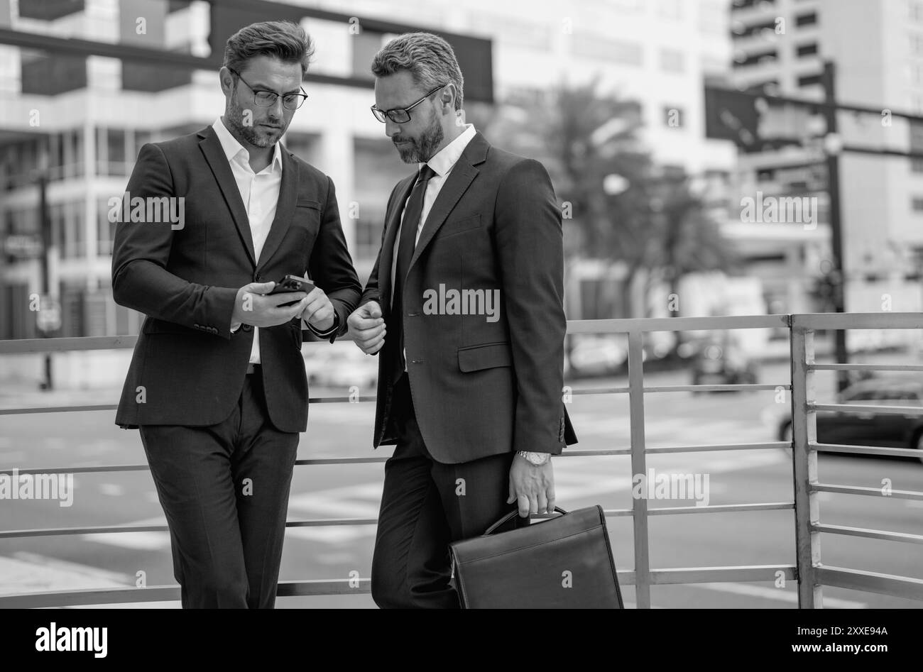 Business people walking talk Black and White Stock Photos & Images - Alamy