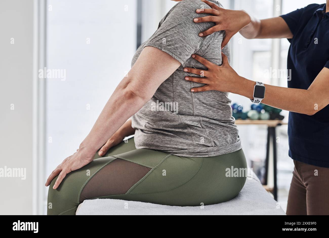 Physiotherapy, people and hands on back for massage, healing and ...