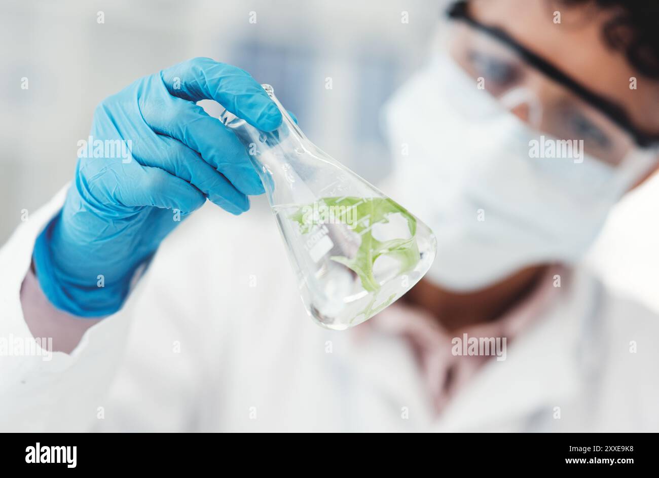 Laboratory environment beaker gloves hi-res stock photography and images - Alamy