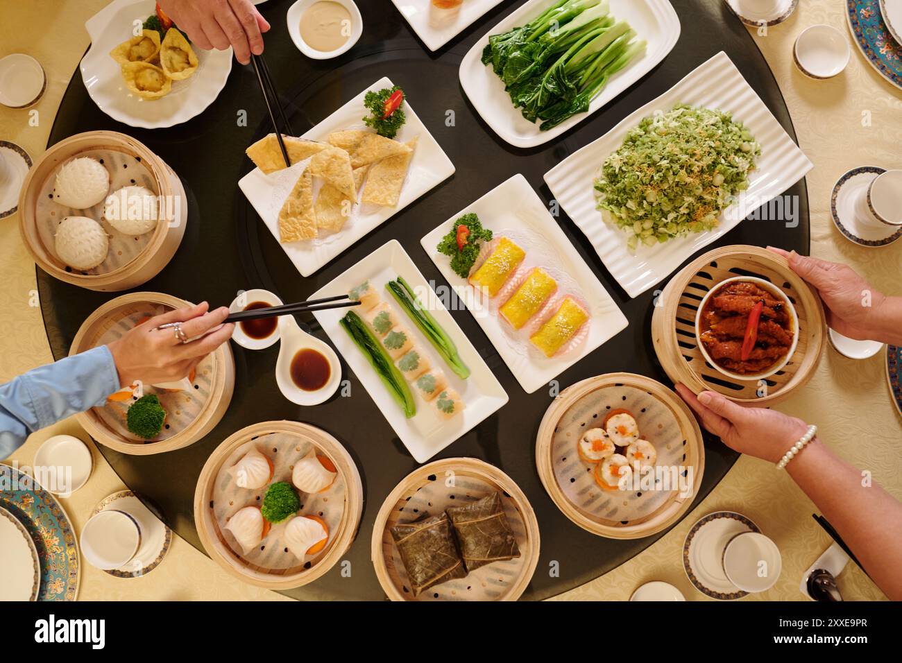 Family Eating Chinese Meal In The Restaurant Stock Photo - Alamy