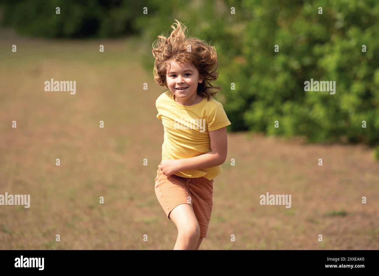 Child running in summer street. Kid enjoy run. Kid running on ...