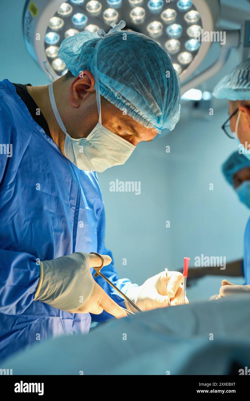 The surgeon operates on the patient under anesthesia Stock Photo - Alamy