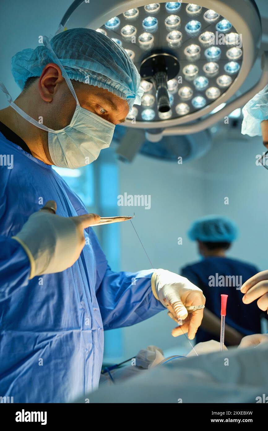 The surgeon operates on the patient under anesthesia Stock Photo - Alamy