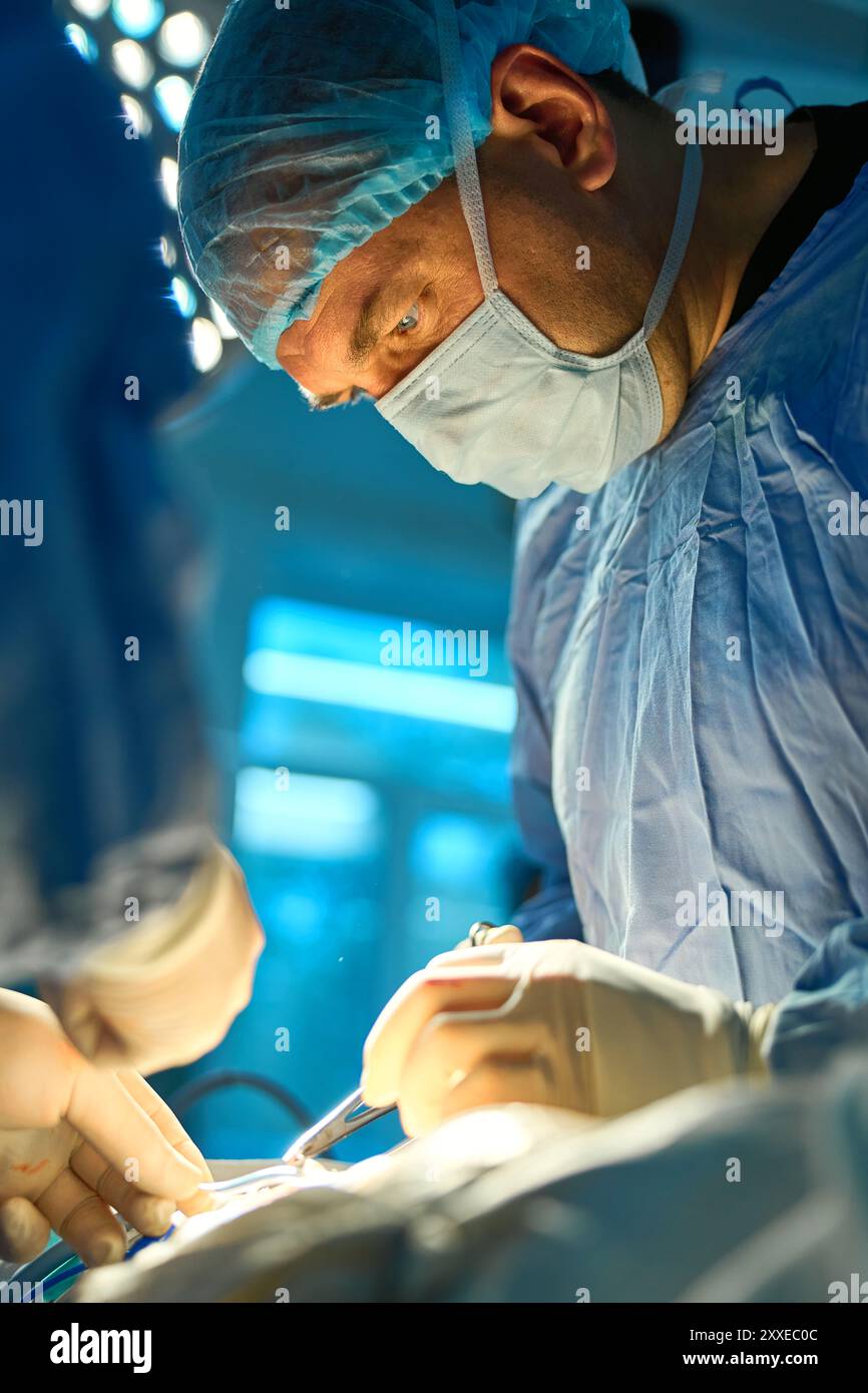 The surgeon operates on the patient under anesthesia Stock Photo - Alamy