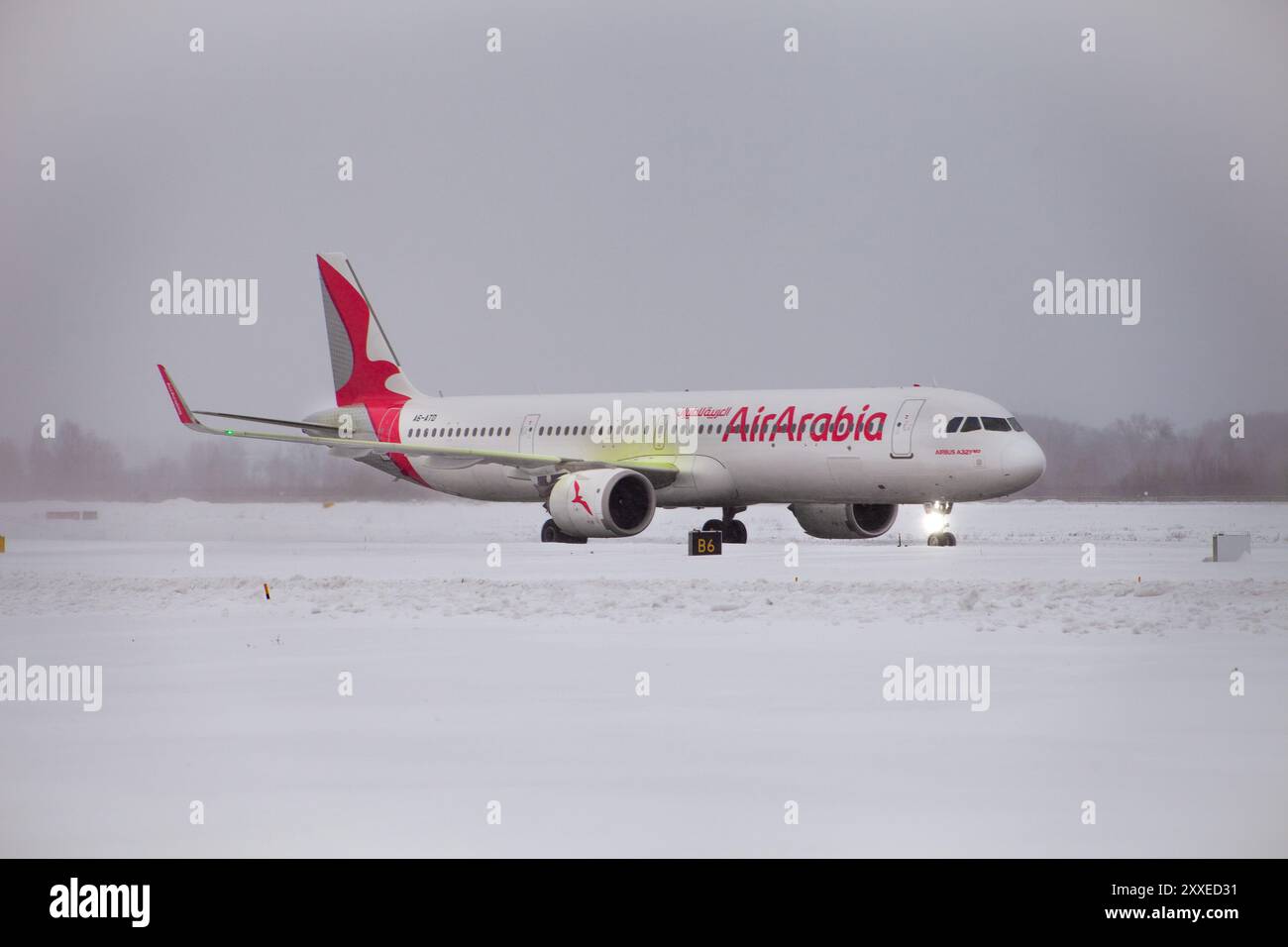 Poor visibility fog. Passenger plane A6-ATD AIR ARABIA Airbus A320neo ...