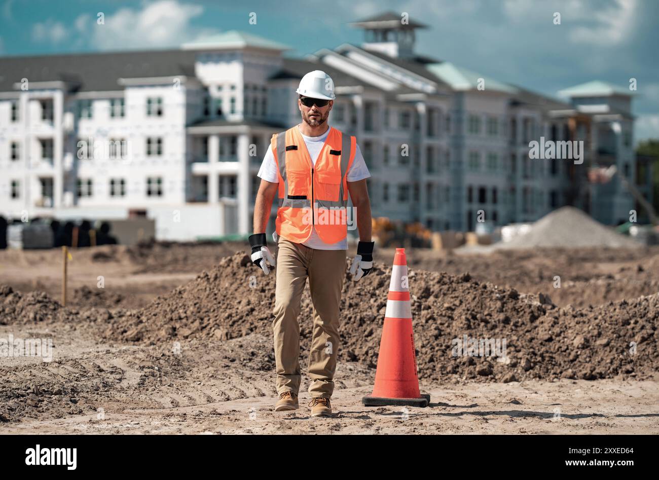 Hispanic man construction worker in helmet at building. Construction ...